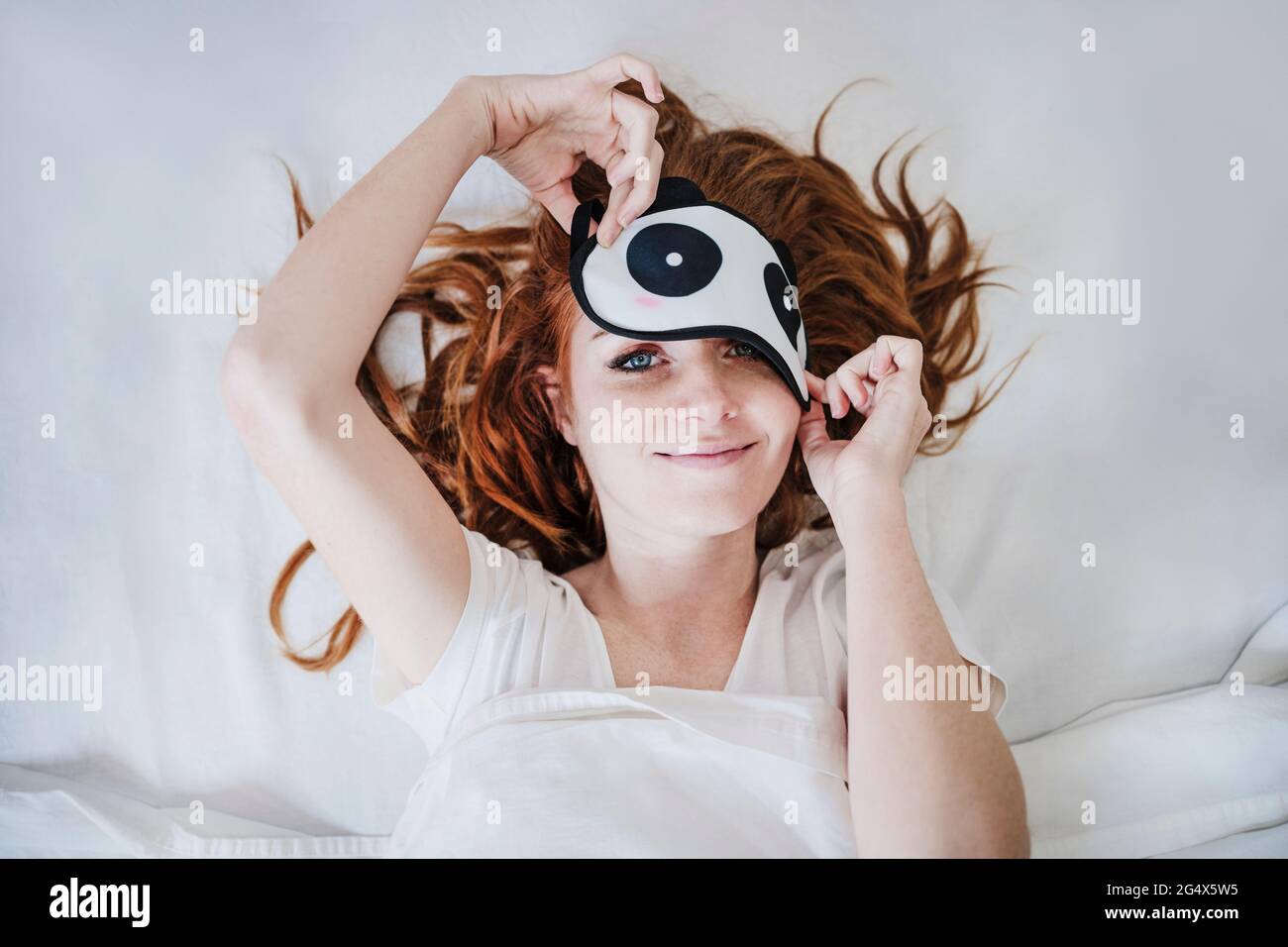 Woman bed eye mask hi-res stock photography and images - Alamy