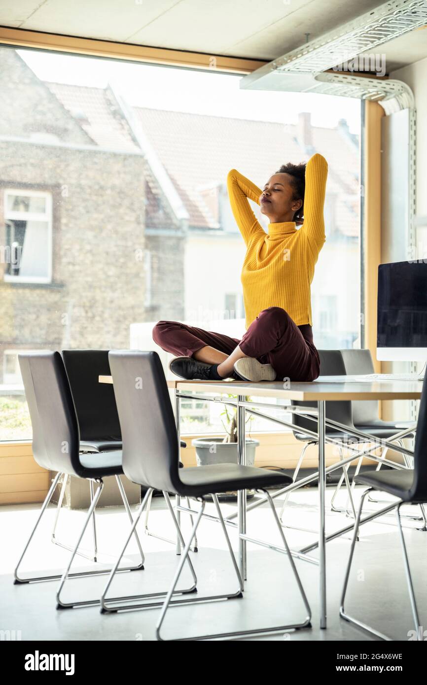 Woman arms raised desk hi-res stock photography and images - Alamy