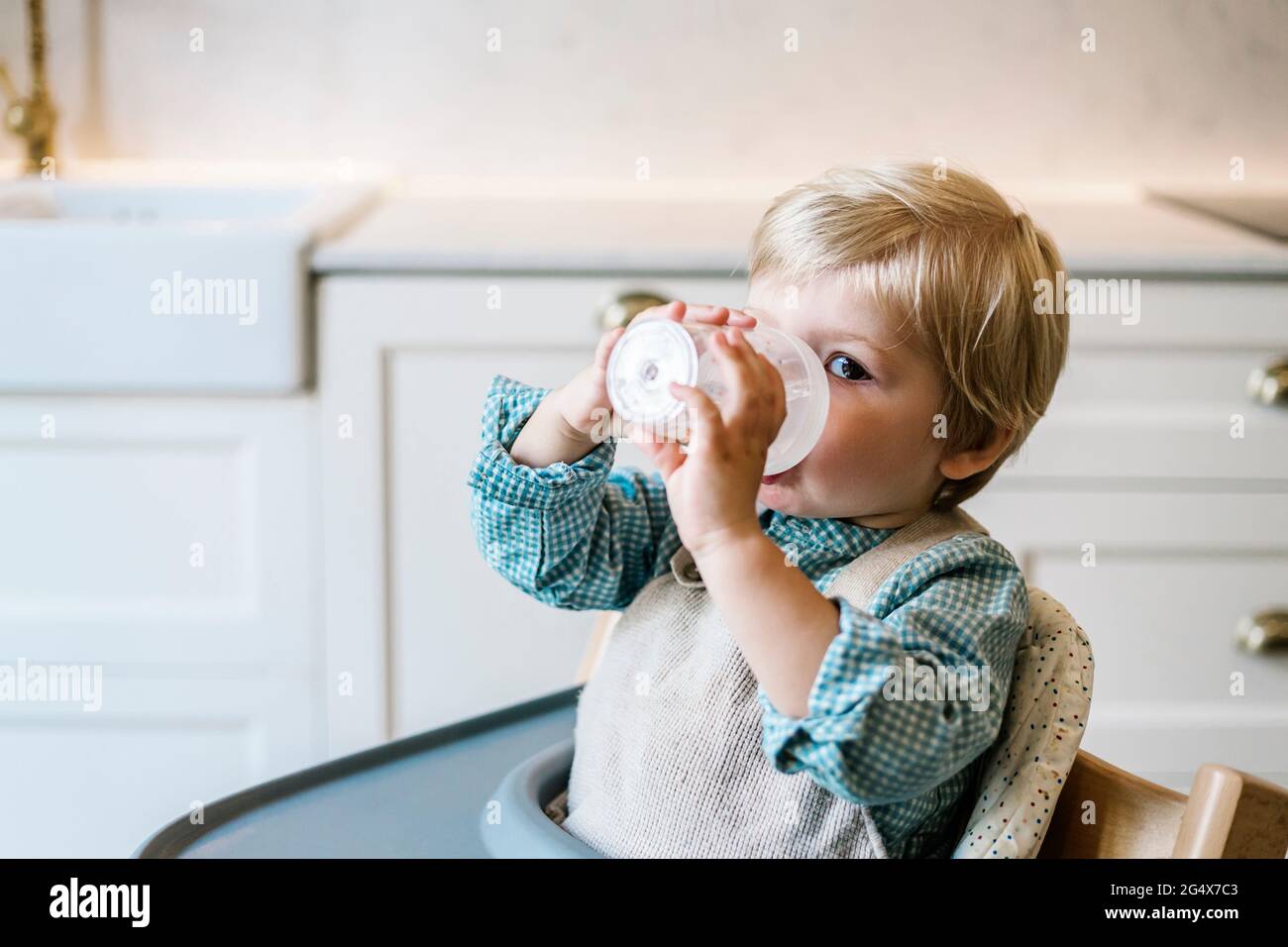 Boy drinking glass of milk hi-res stock photography and images - Alamy
