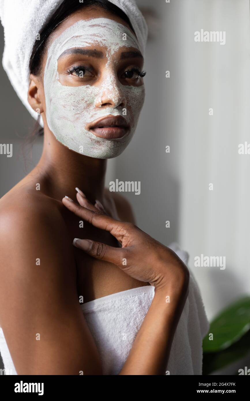 Woman wrapped in towel bathroom hi-res stock photography and images - Alamy