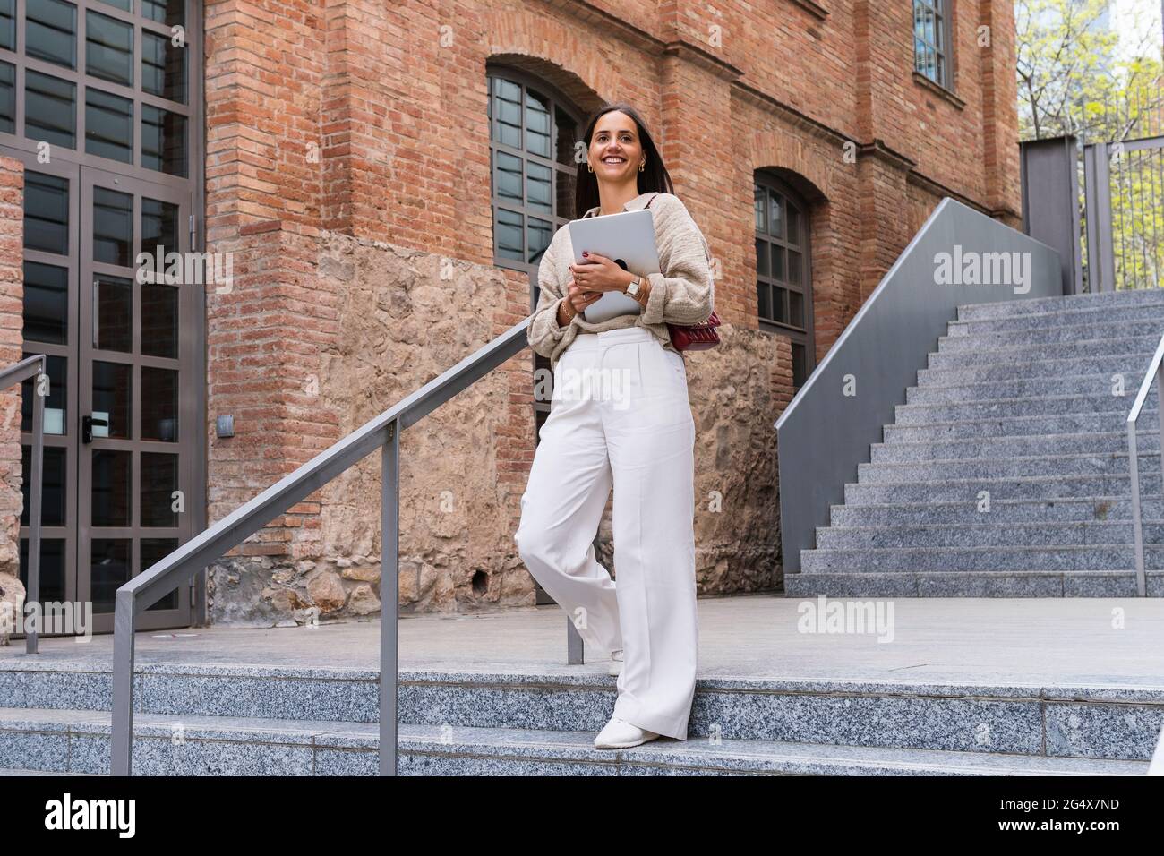 Walking smiling steps architecture hi-res stock photography and images ...