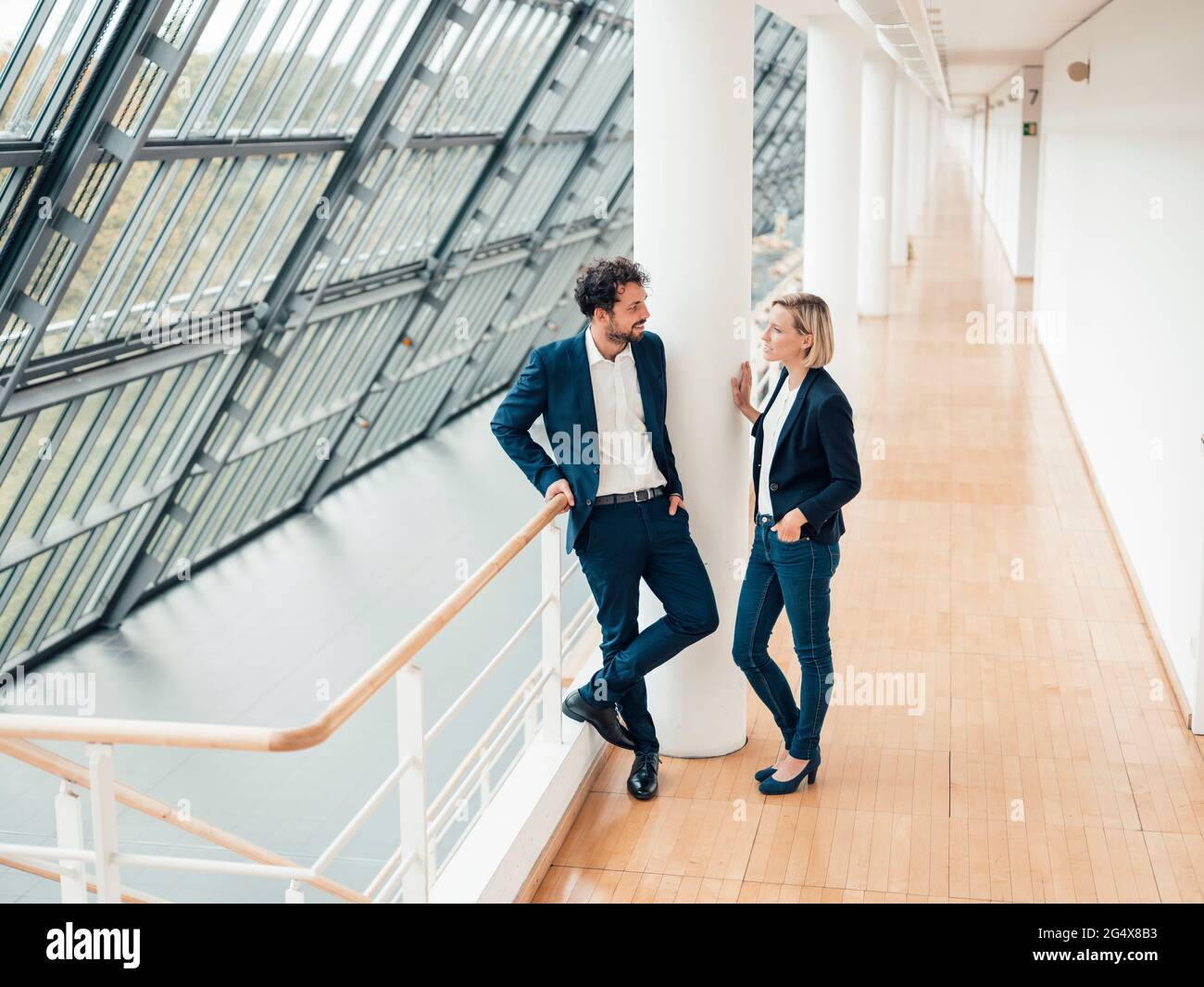 Male female colleagues having hi-res stock photography and images - Alamy