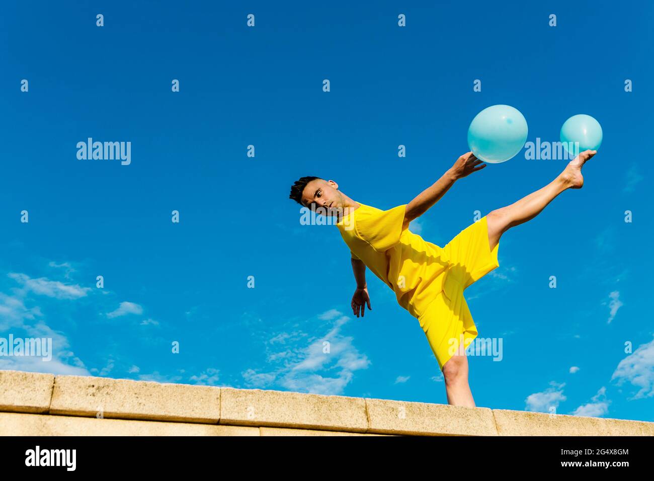 Standing man with balloons hi-res stock photography and images - Alamy