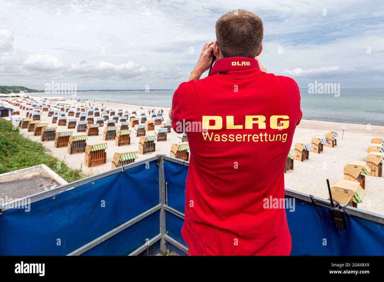 Timmndorfer Strand, Germany. 23rd June, 2021. A lifeguard of the German ...