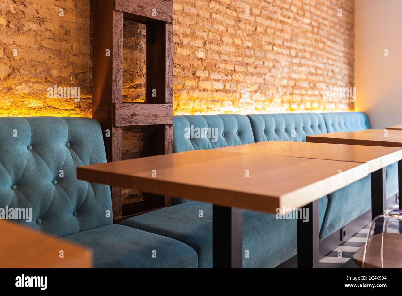 Couch and tables in bar Stock Photo - Alamy