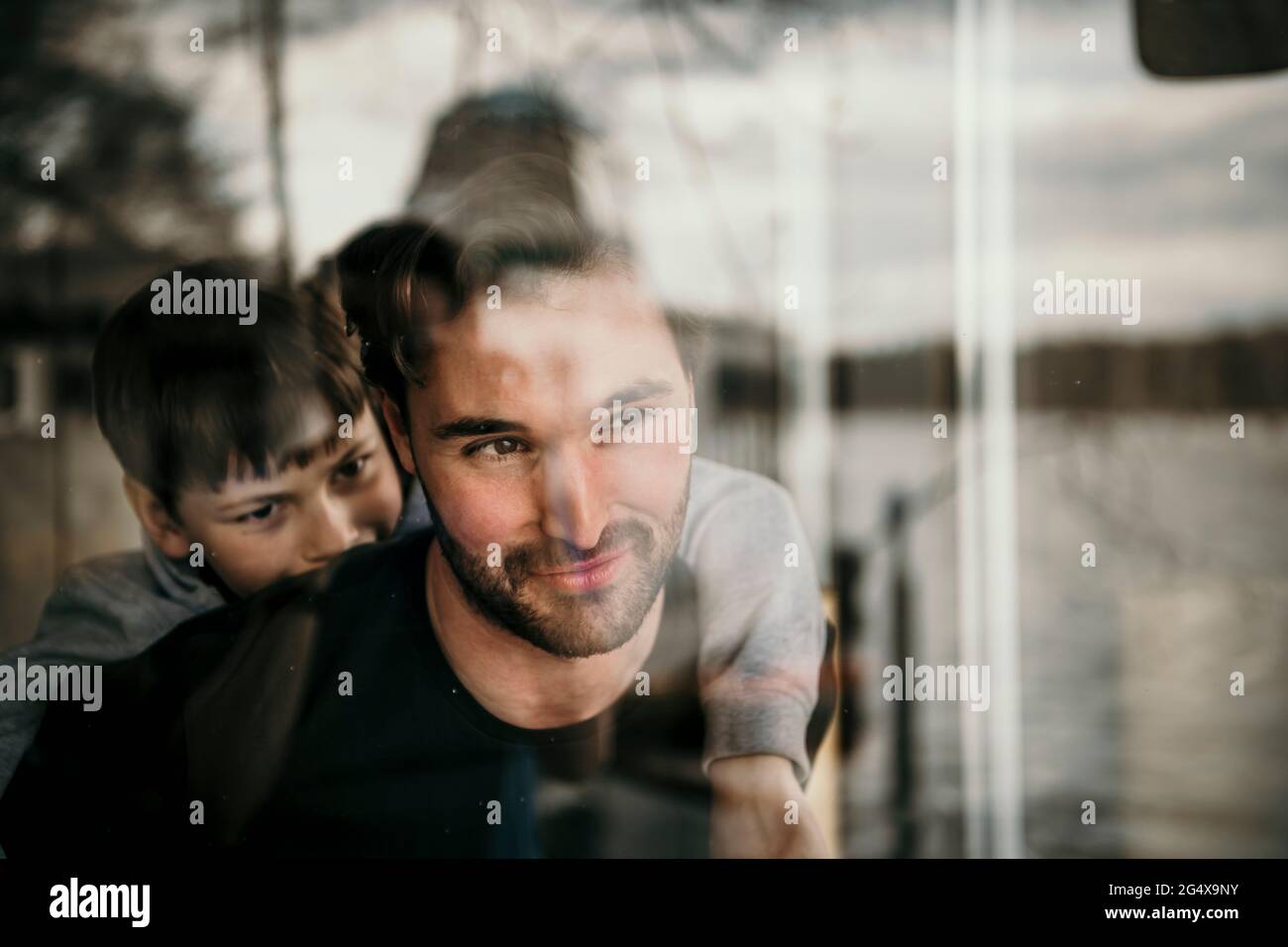 Father son reflection hi-res stock photography and images - Alamy