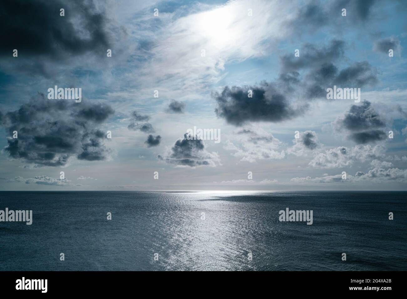 Dramatic sky over ocean Stock Photo - Alamy