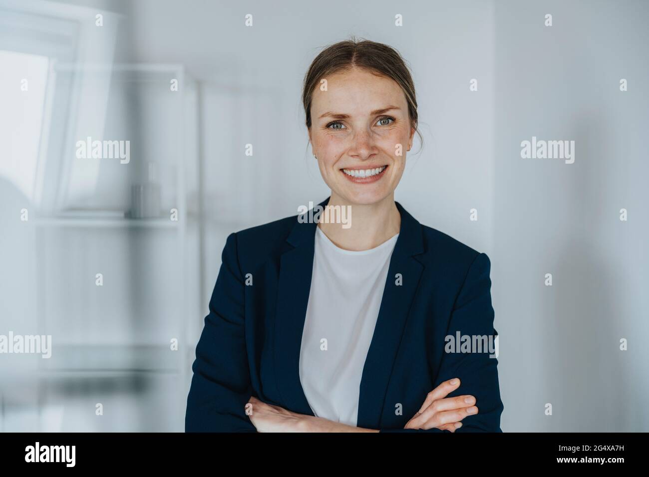 Crossed smiling hi-res stock photography and images - Alamy