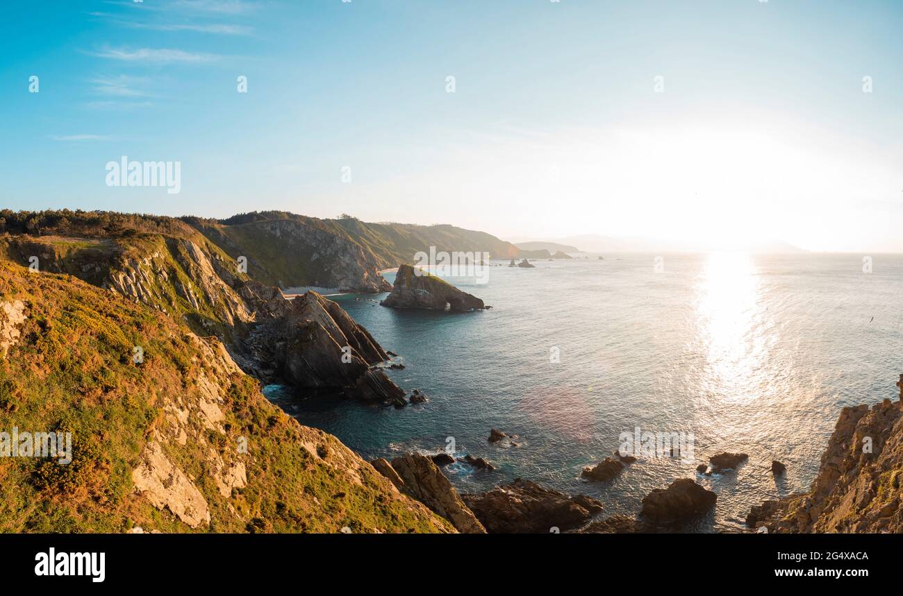 Coastal cliffs at sunset Stock Photo - Alamy