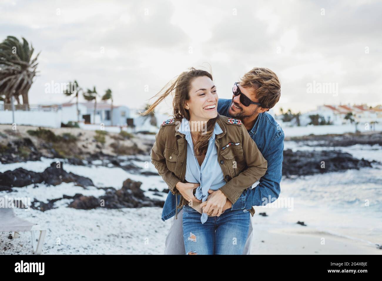 Man from behind on beach hi-res stock photography and images - Alamy