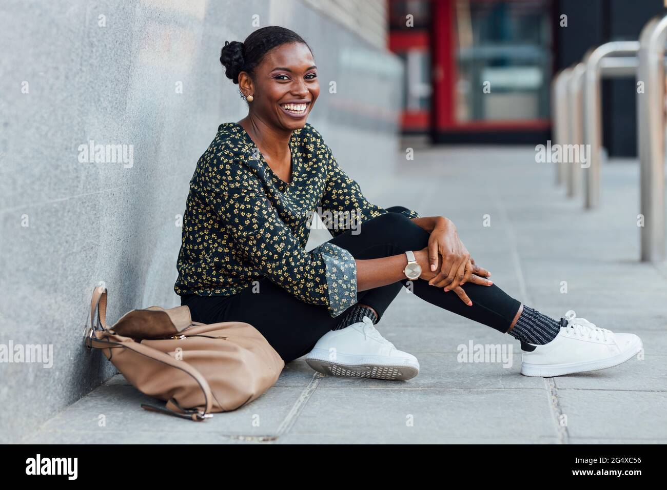 Sitting with backpack hi-res stock photography and images - Alamy