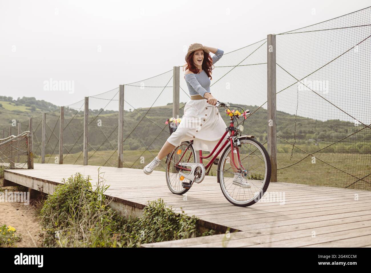 Riding bike on pier hi-res stock photography and images - Alamy