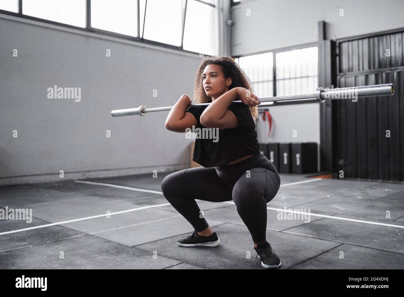 Woman squats exercise hi-res stock photography and images - Alamy
