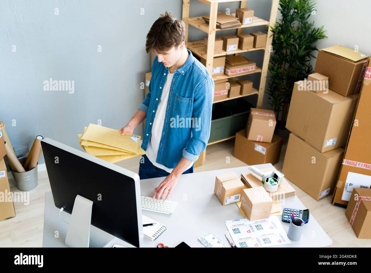 Caucasian businessman working on computer hi-res stock photography and ...