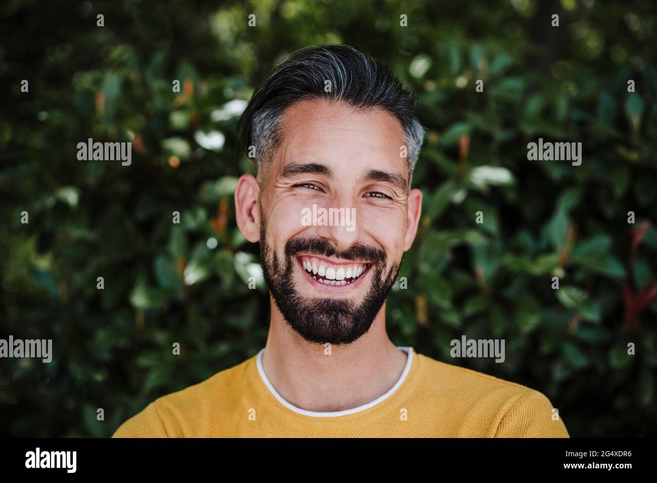 Bearded man smiling hi-res stock photography and images - Alamy