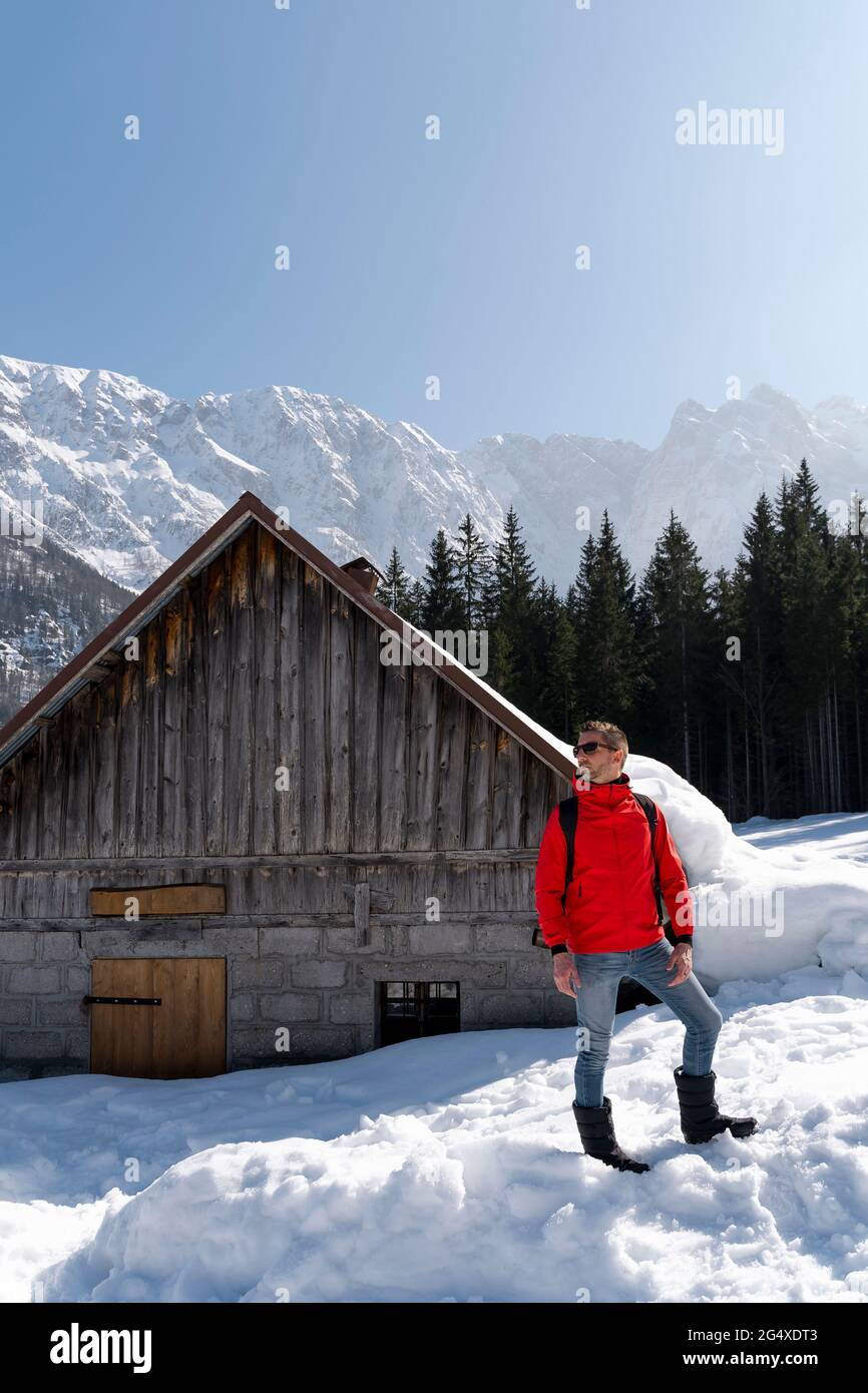 Man in front mountain hut hi-res stock photography and images - Alamy