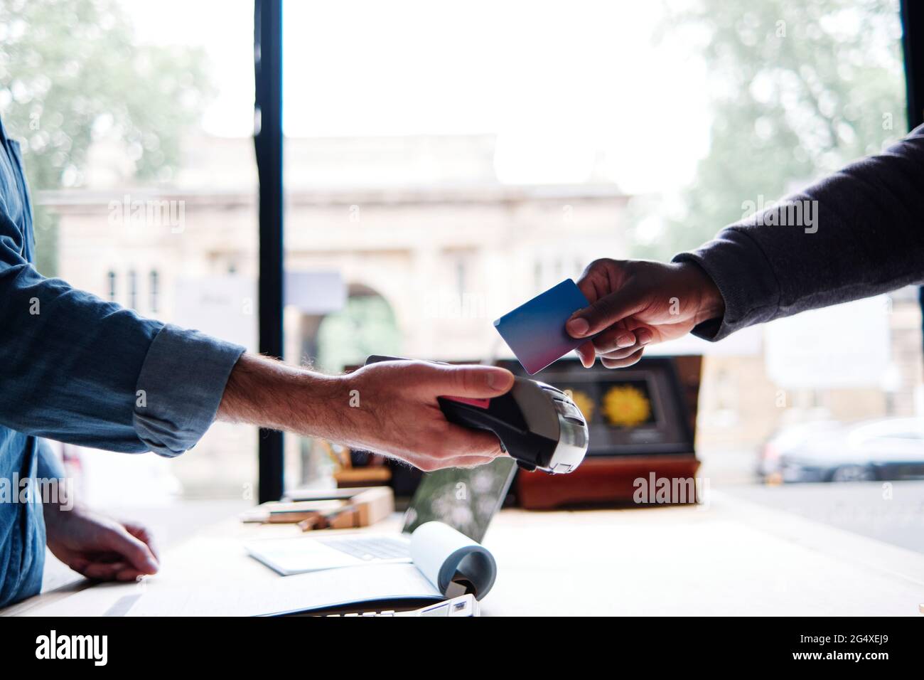 Customer making payment hi-res stock photography and images - Alamy