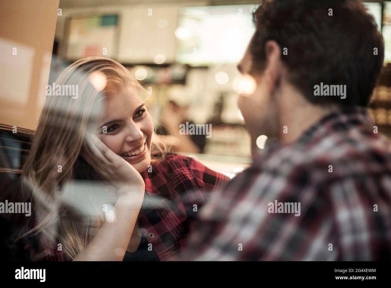 Couple seen through window hi-res stock photography and images - Alamy