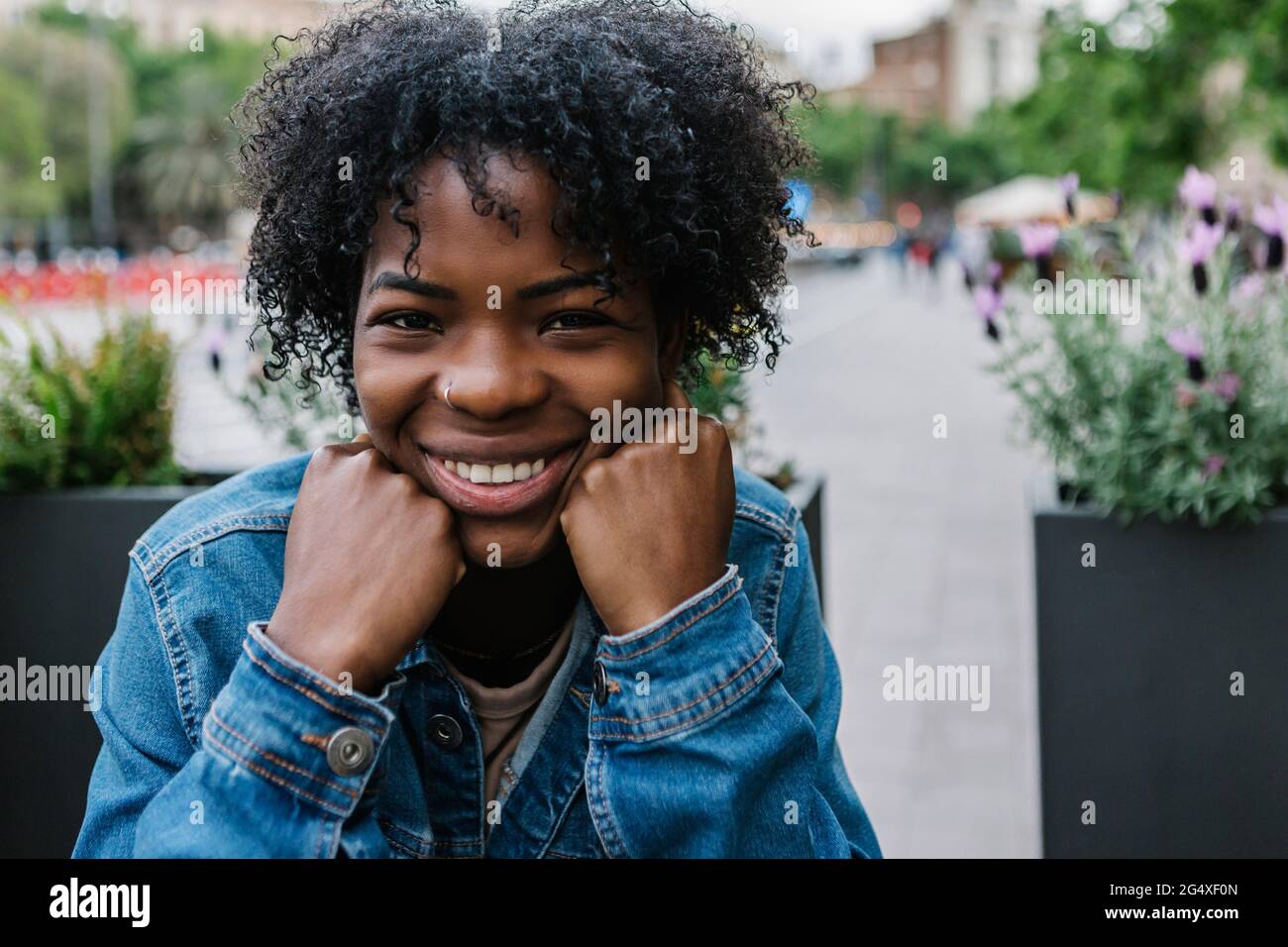 Chin on hands hi-res stock photography and images - Alamy