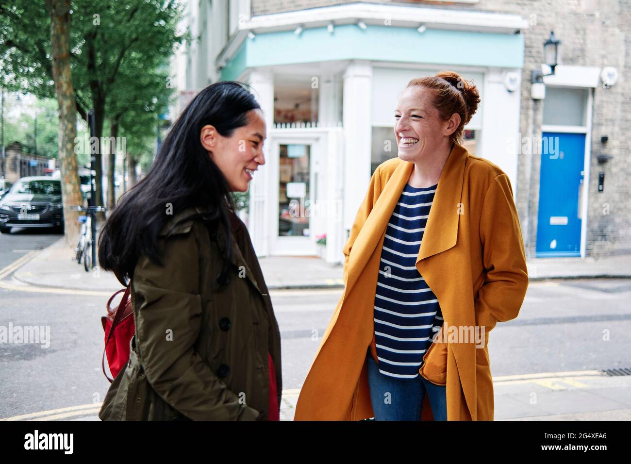 Happy adult female talking hi-res stock photography and images - Alamy