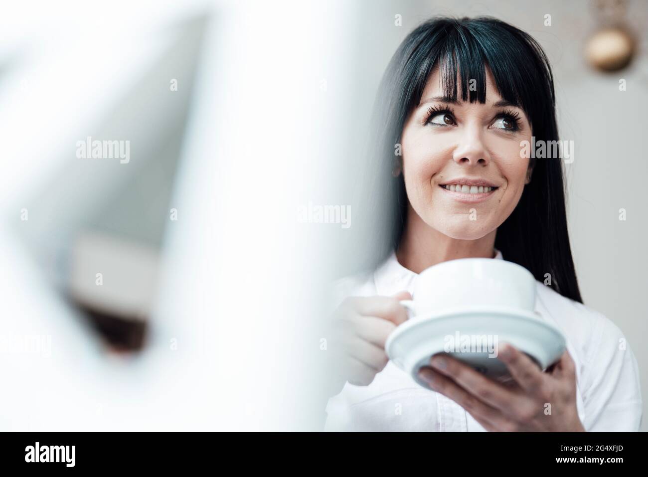 Smiling owner coffee cup hi-res stock photography and images - Alamy