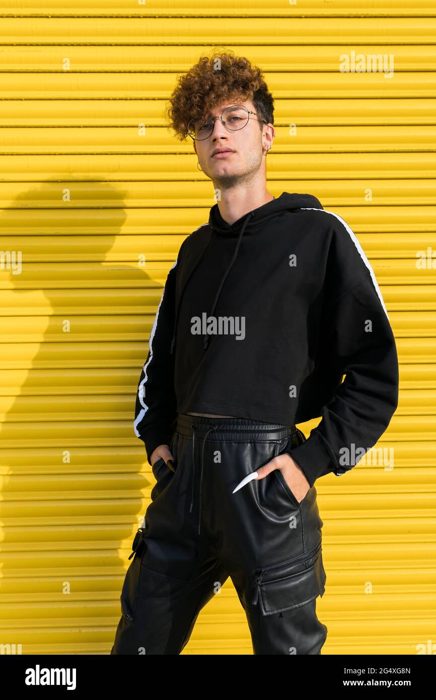 Man standing in front of roller shutter hi-res stock photography and ...