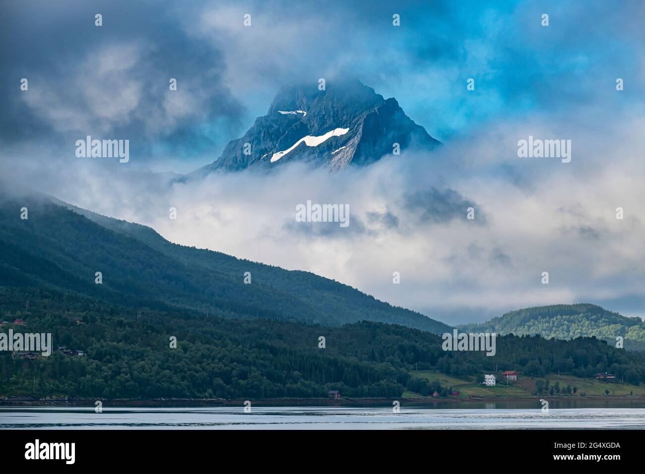 Mountain looking through fog at Kystriksveien, Norway Stock Photo - Alamy