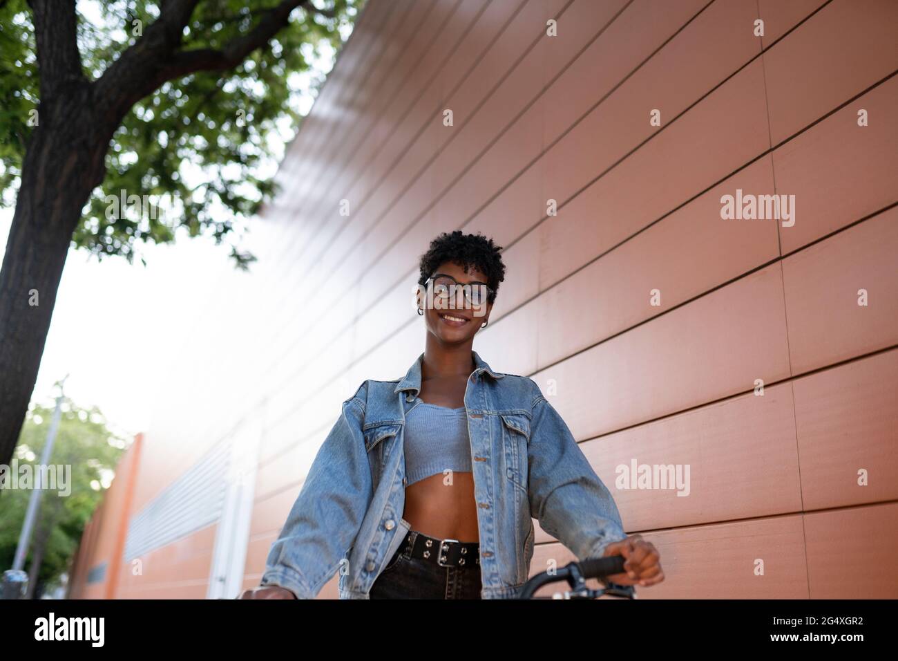 Woman wearing glasses denim hi-res stock photography and images - Alamy