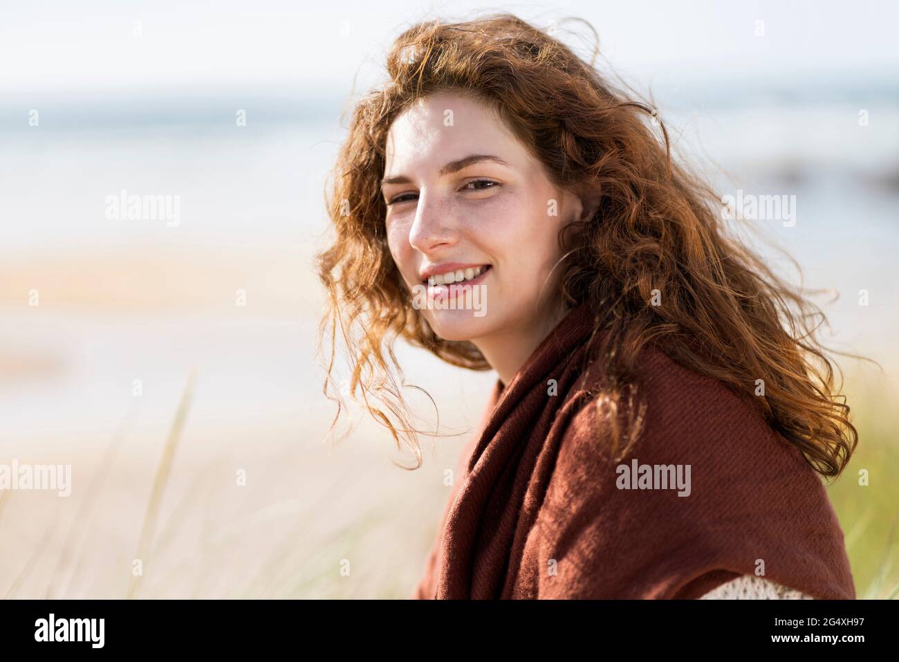 Female redhead beach hi-res stock photography and images - Alamy