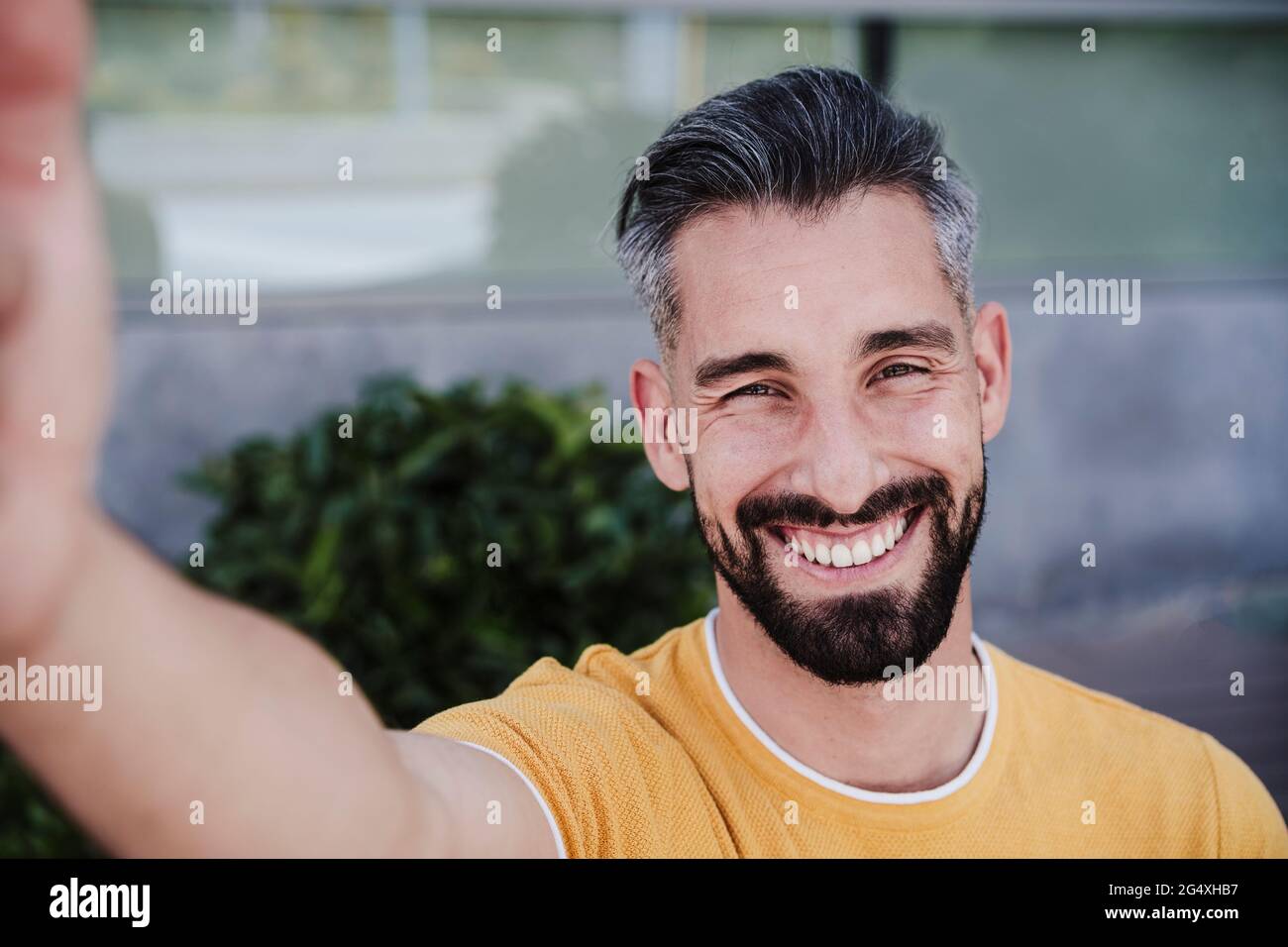 Positive smart casual man hi-res stock photography and images - Alamy