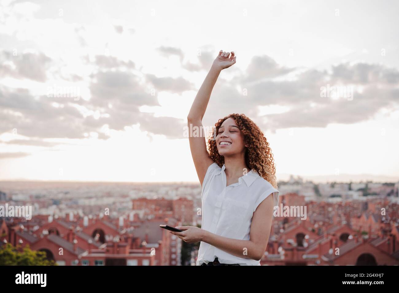 Hand raised holding hi-res stock photography and images - Alamy