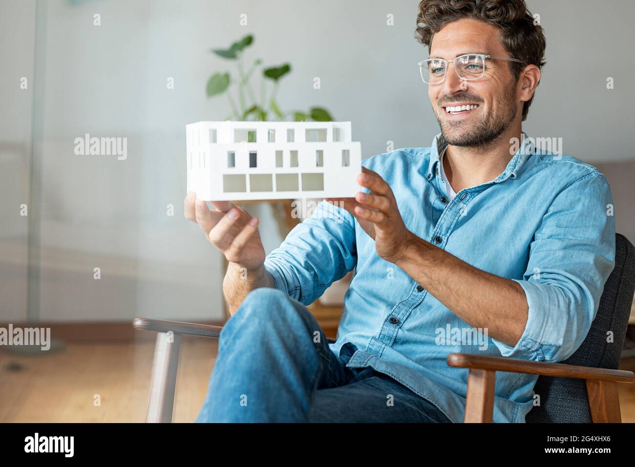 Male model sitting chair hi-res stock photography and images - Alamy