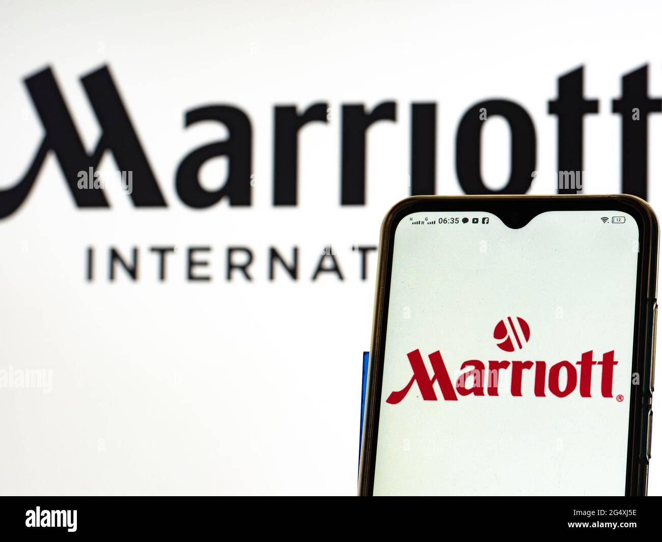 In this photo illustration a Marriott International, Inc. logo seen ...