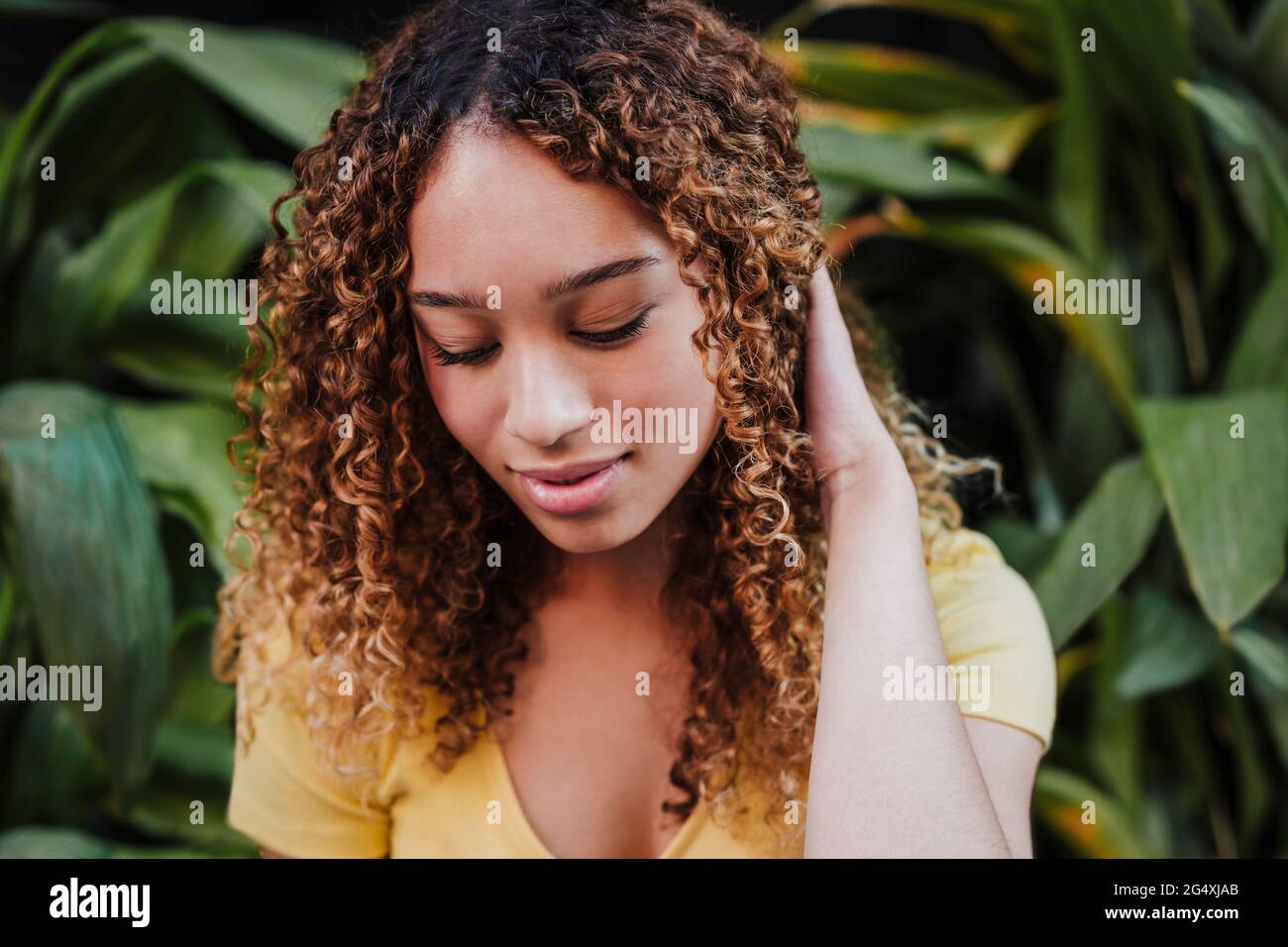 Beautiful woman looking down hi-res stock photography and images - Alamy