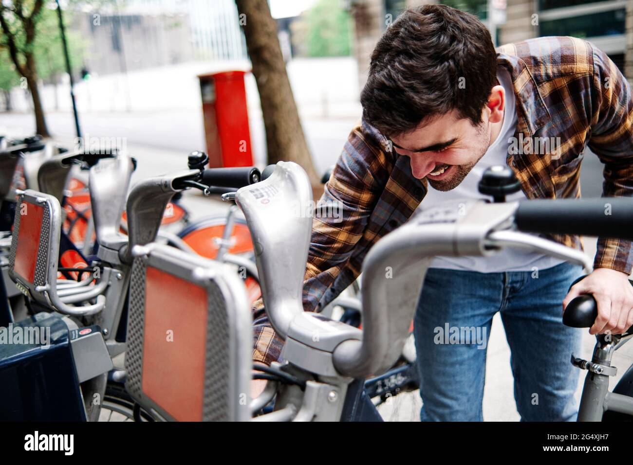 Man stationary bike hi-res stock photography and images - Alamy