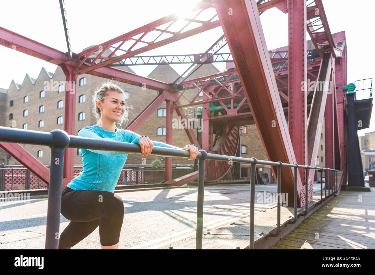 Leaning on metal railing hi-res stock photography and images - Alamy