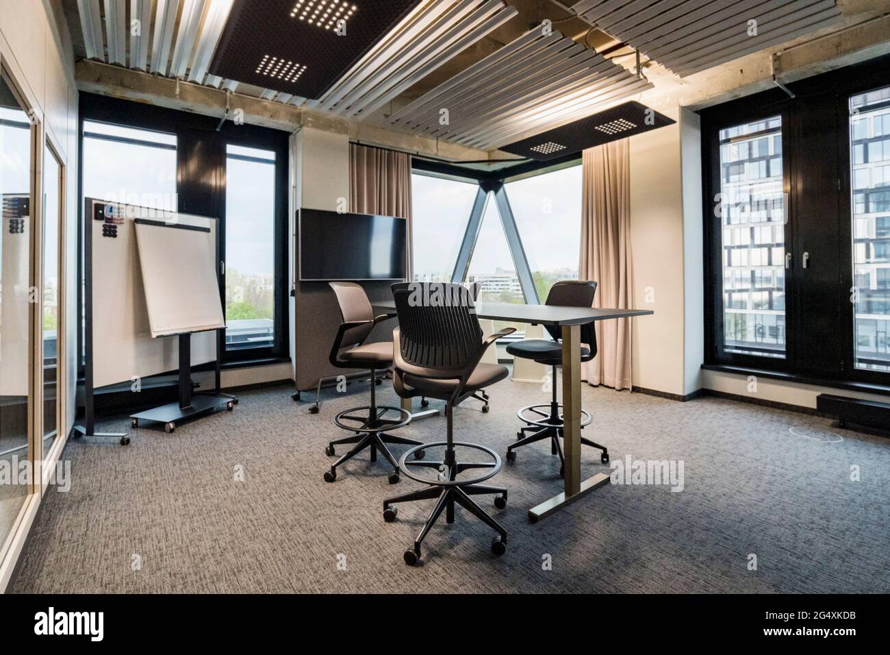 Interior of illuminated modern office Stock Photo - Alamy