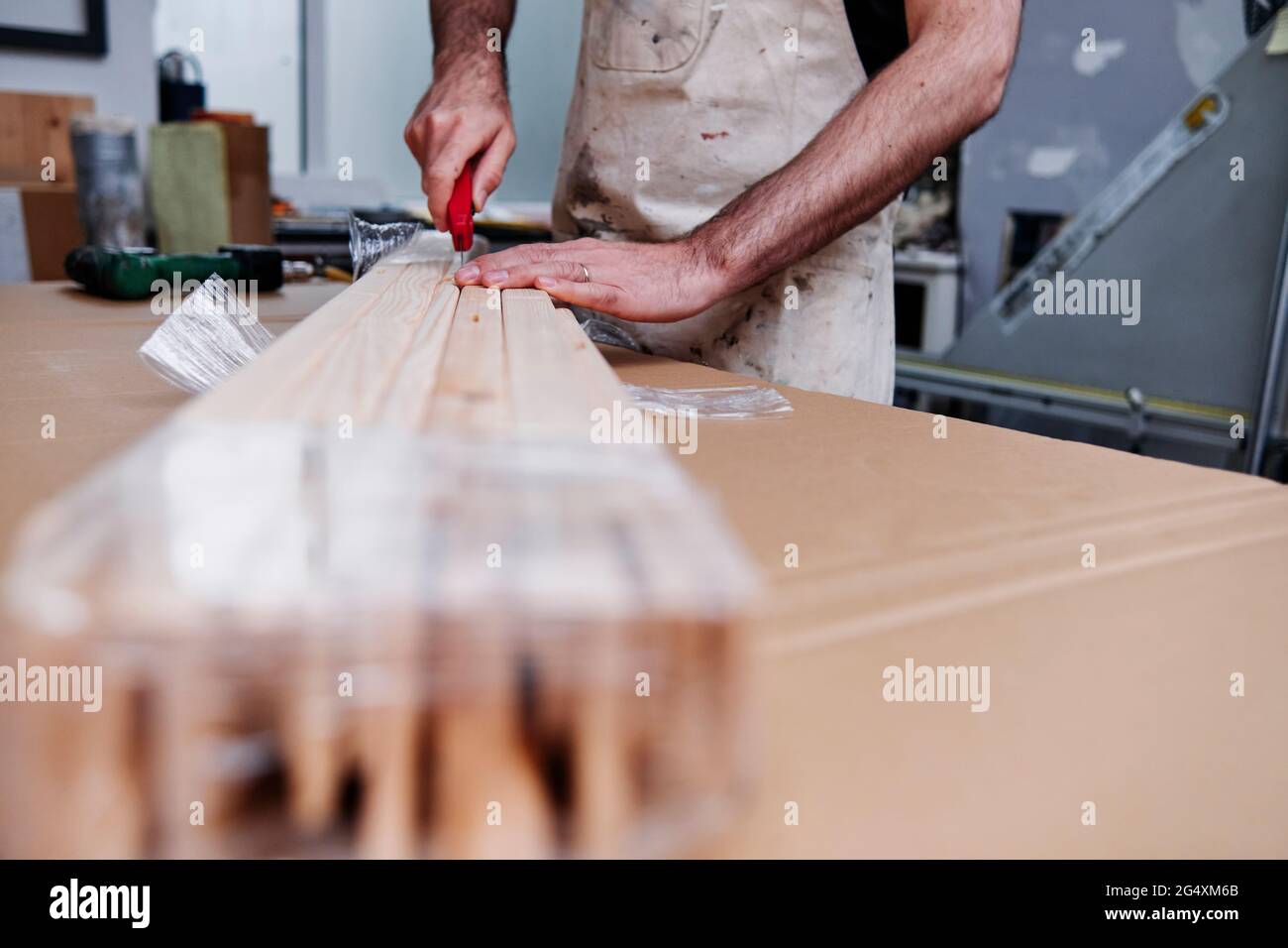 Plastic apron hi-res stock photography and images - Alamy