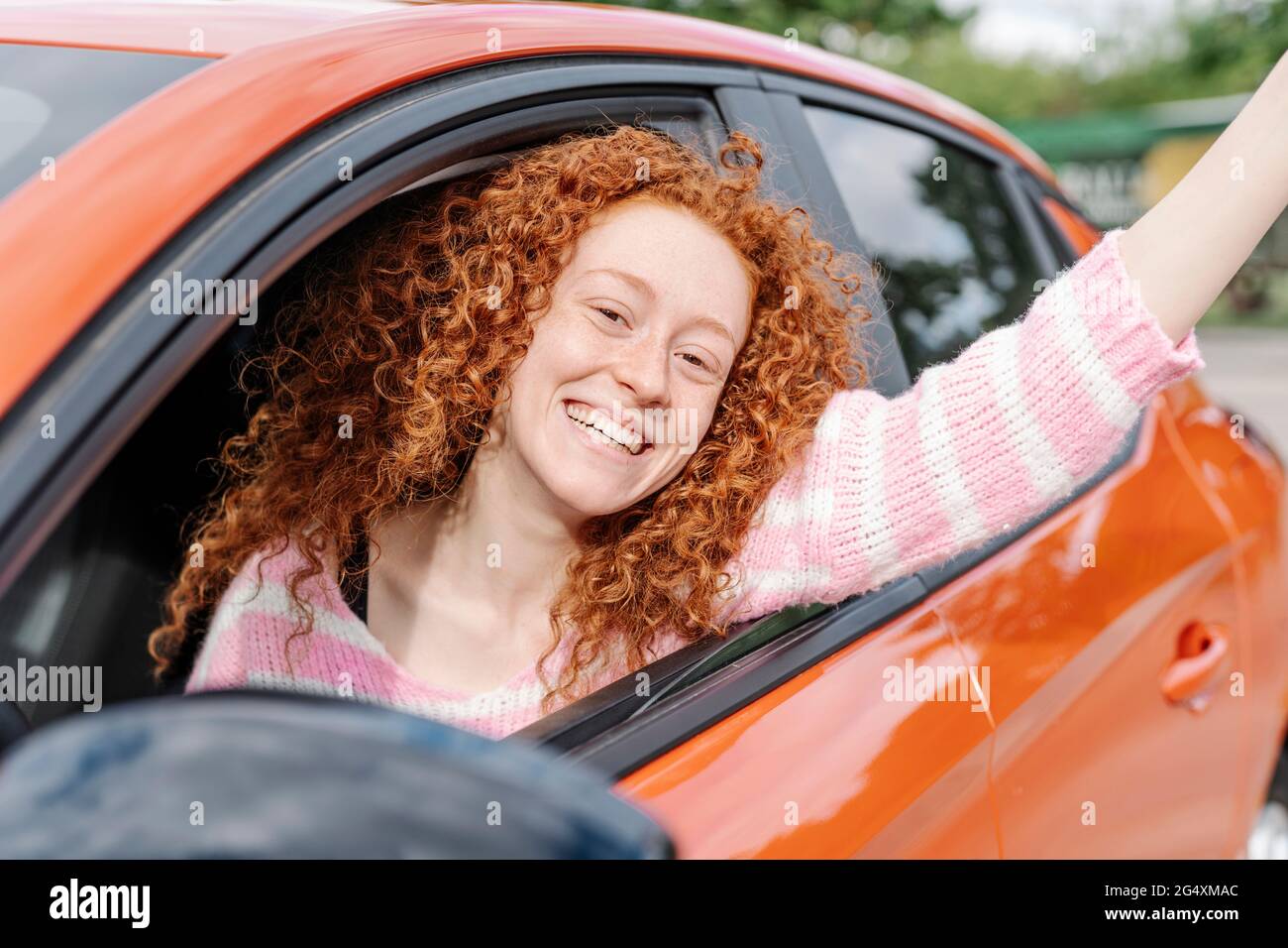 Curly cheerful hi-res stock photography and images - Alamy
