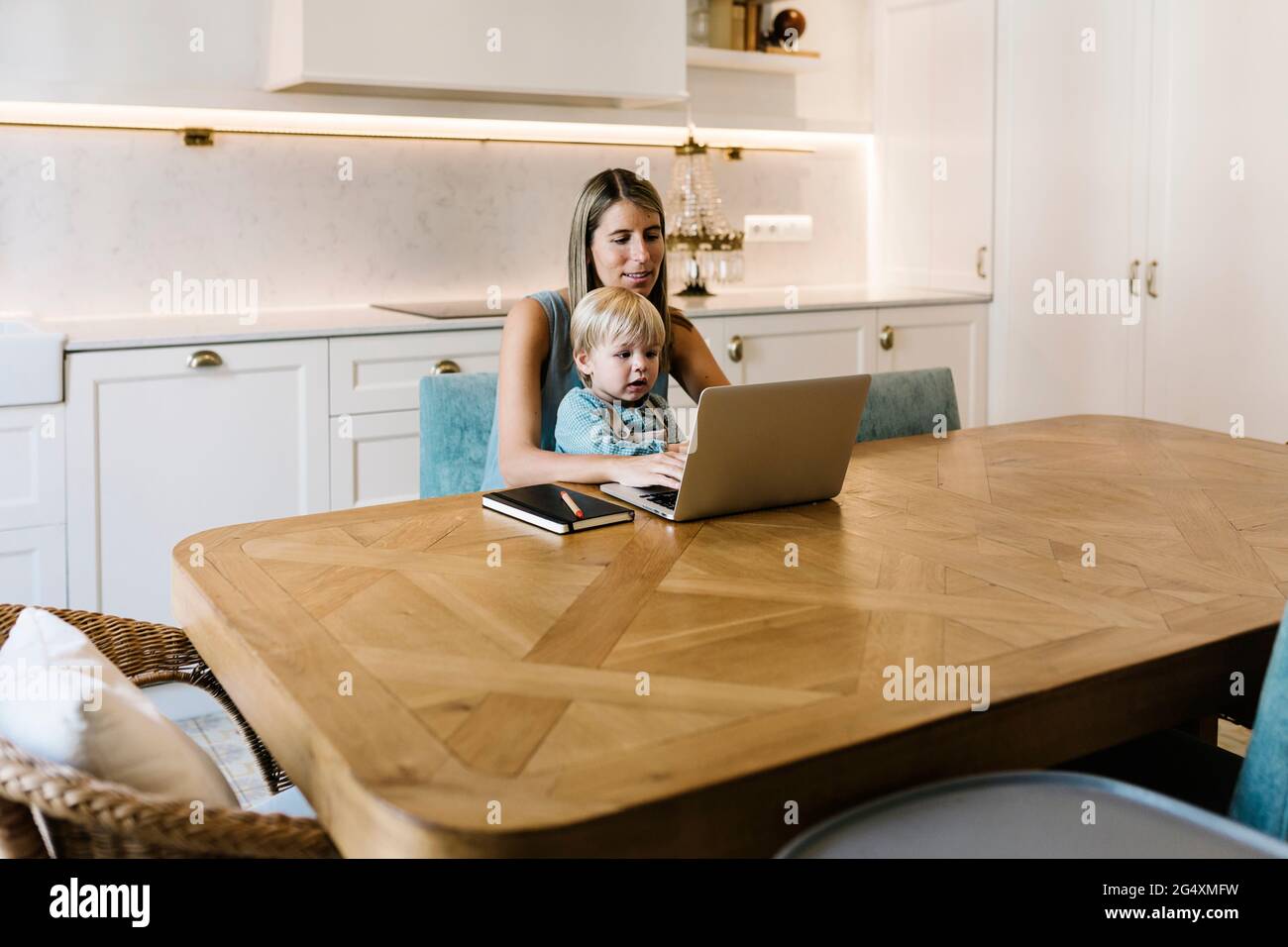 Working at the dining table hi-res stock photography and images - Alamy