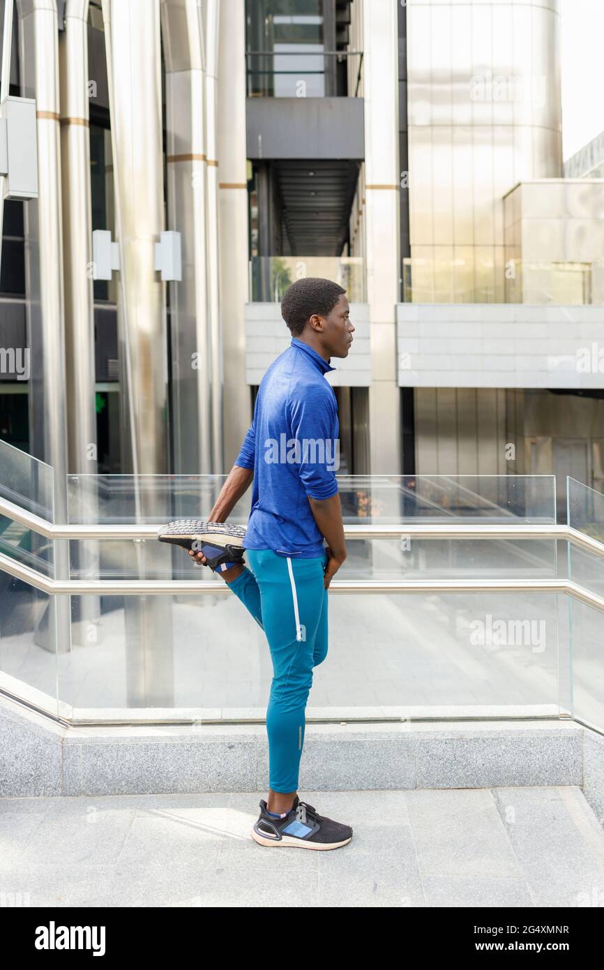 Man on railing hi-res stock photography and images - Alamy