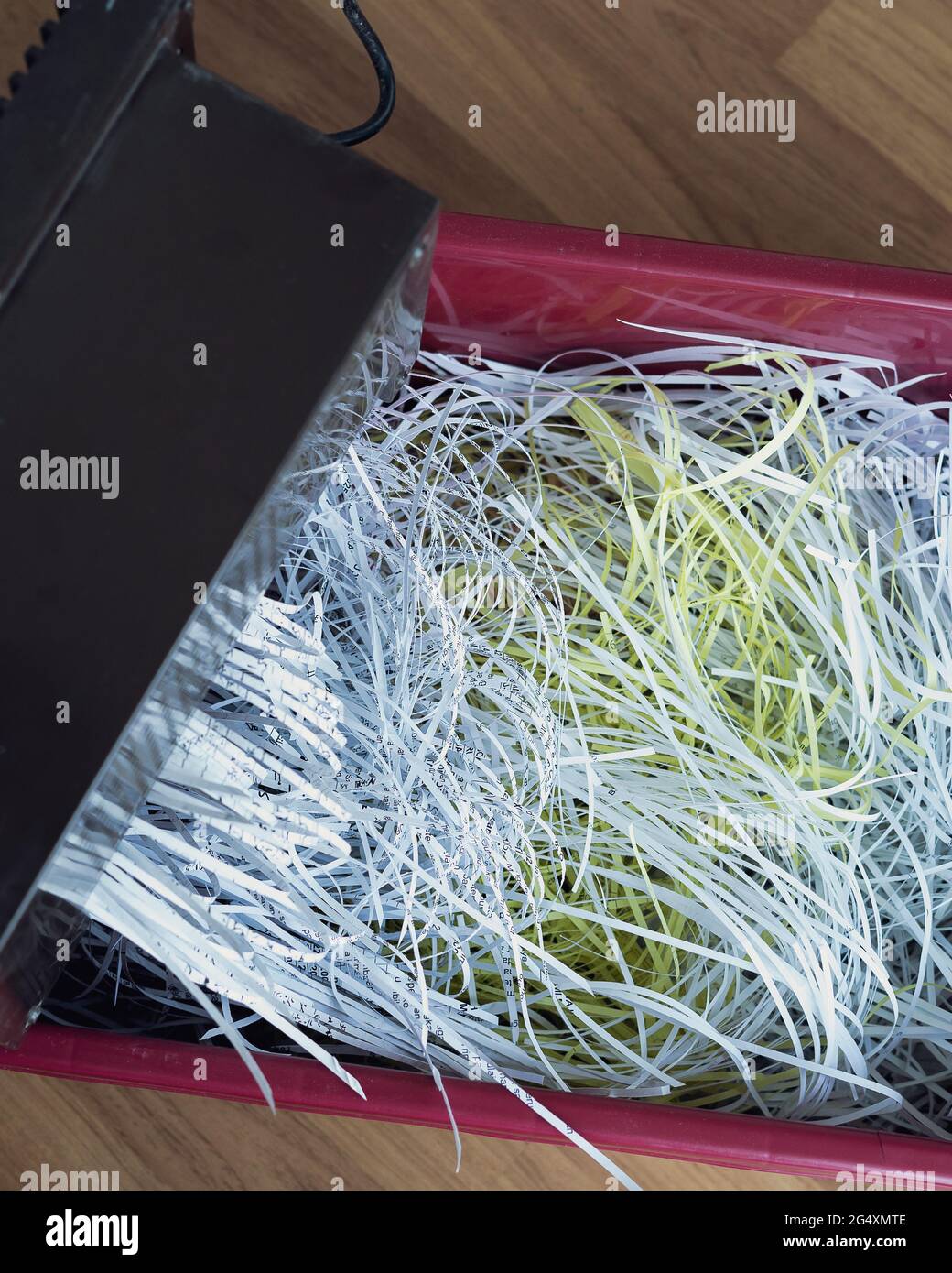 Shredding paper coming out from the machine. Top view. Shredding ...