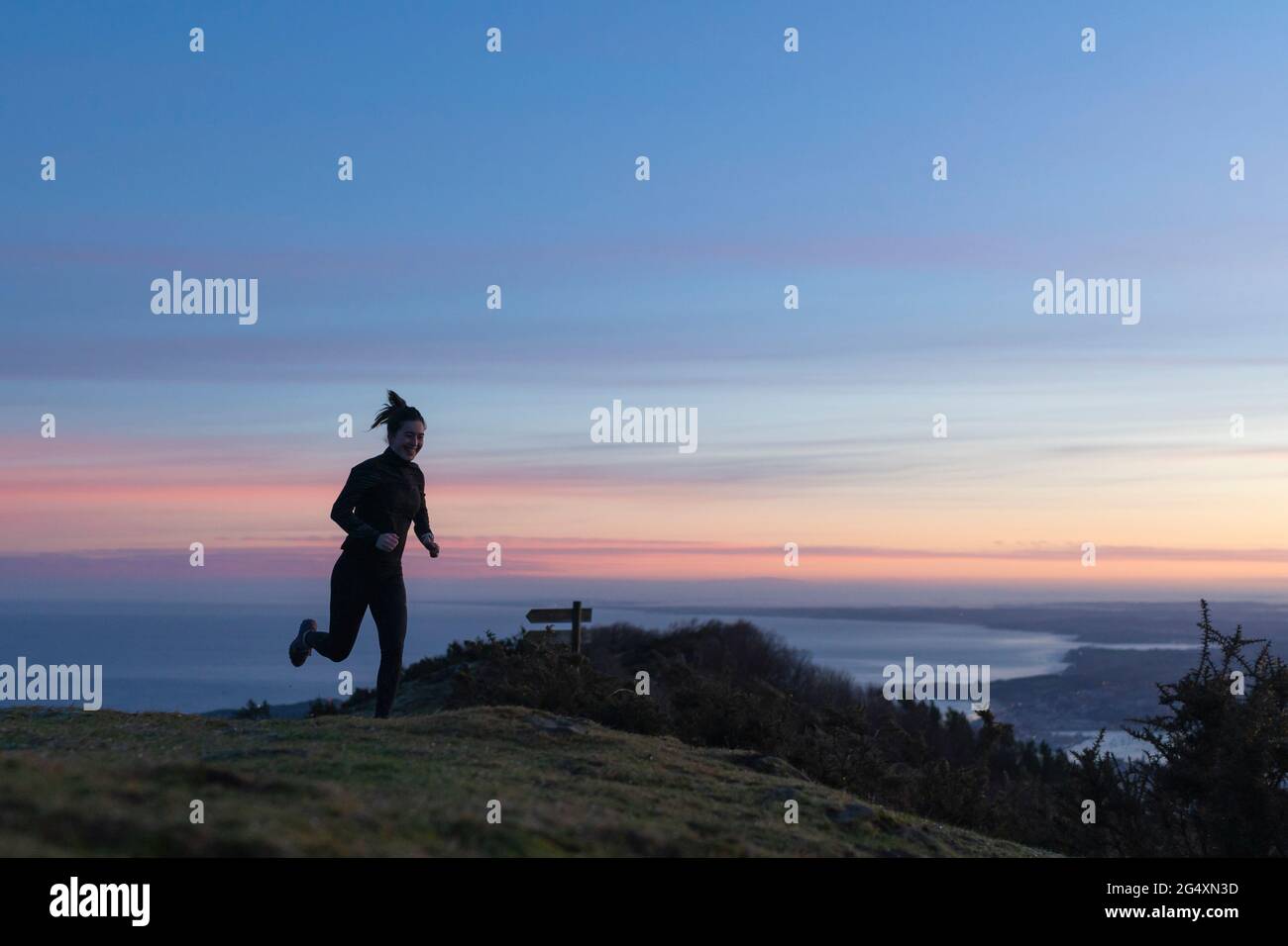 Running the hill hi-res stock photography and images - Alamy