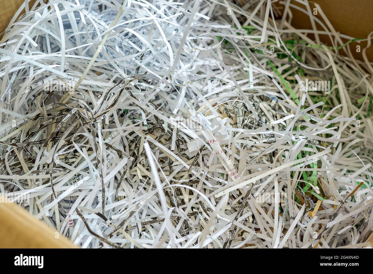 White shredded paper in a carboard box Stock Photo - Alamy