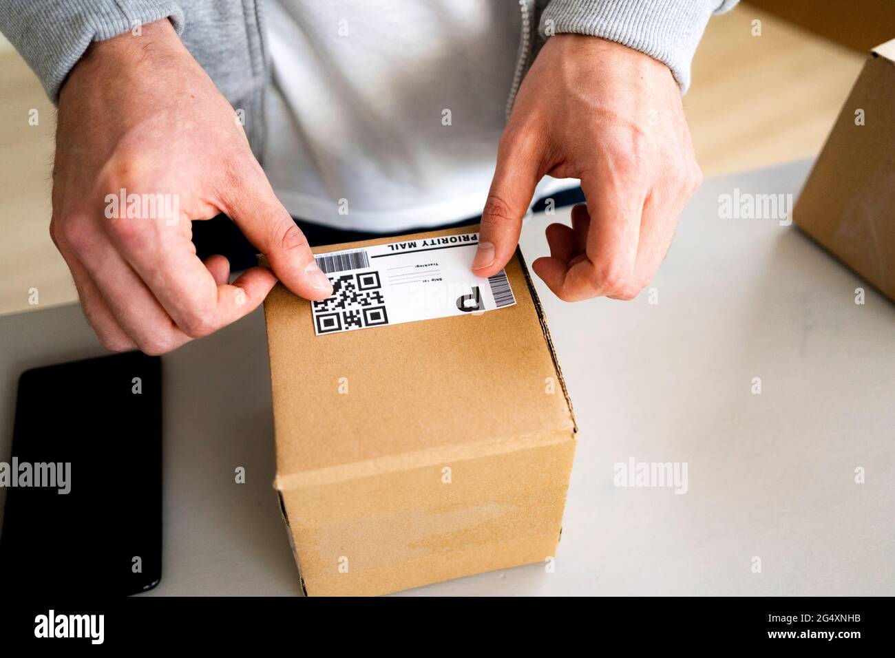 Man at bar desk hi-res stock photography and images - Alamy