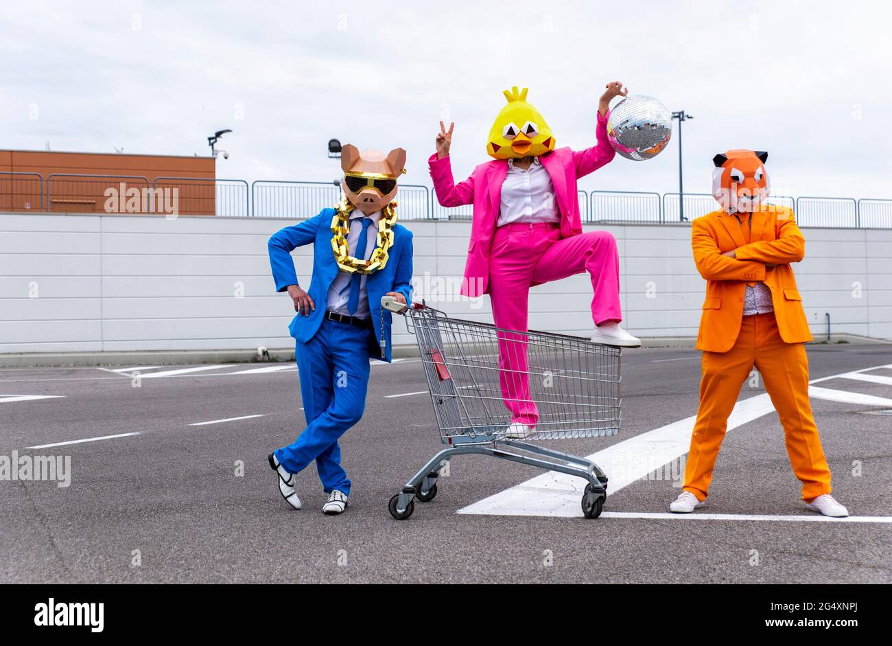 Funny characters wearing animal masks and colored business suits having ...