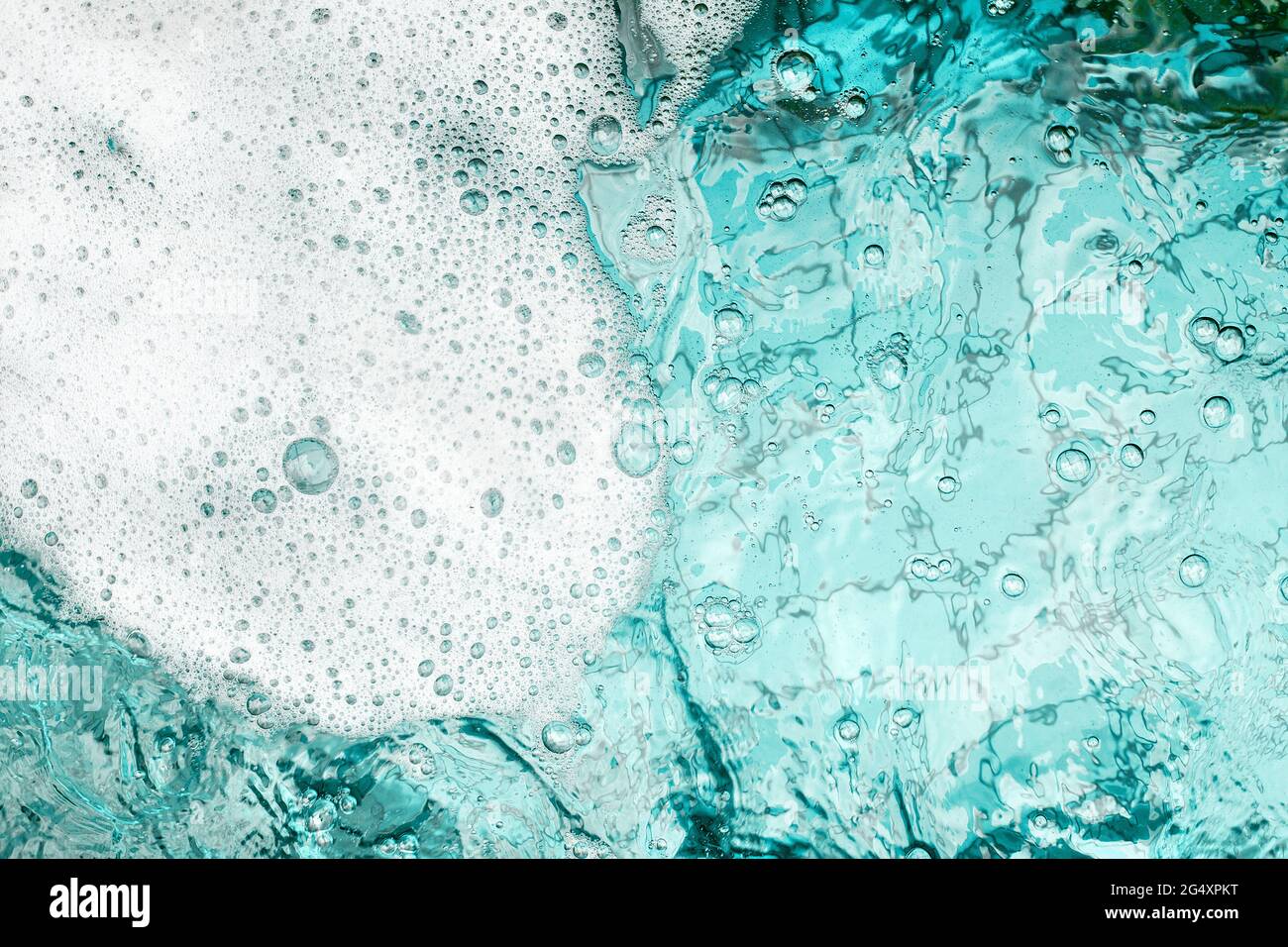 White foam clear blue water background closeup, sea ocean foam wave ...