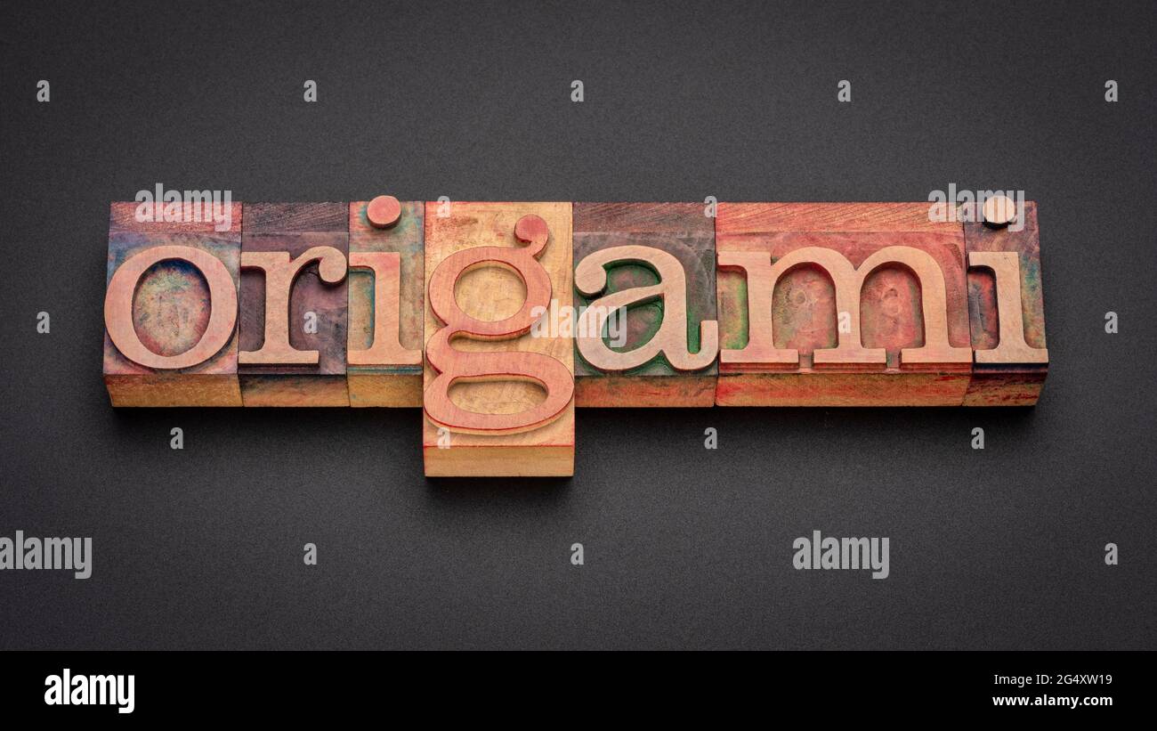 origami word abstract in vintage letterpress wood type, art of paper ...