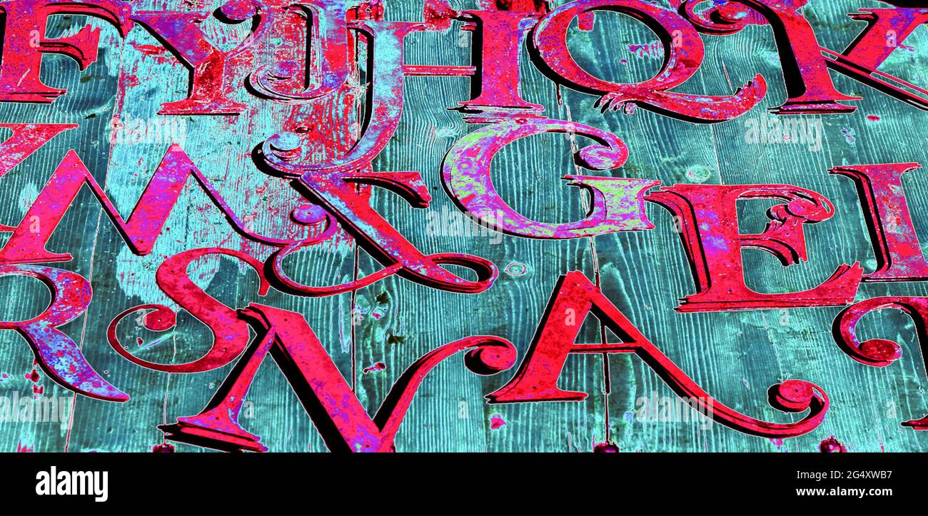 letters of the alphabet on pink background Stock Photo - Alamy