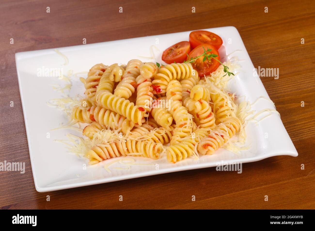 Italian springs pasta with tomato sauce and cheese Stock Photo - Alamy